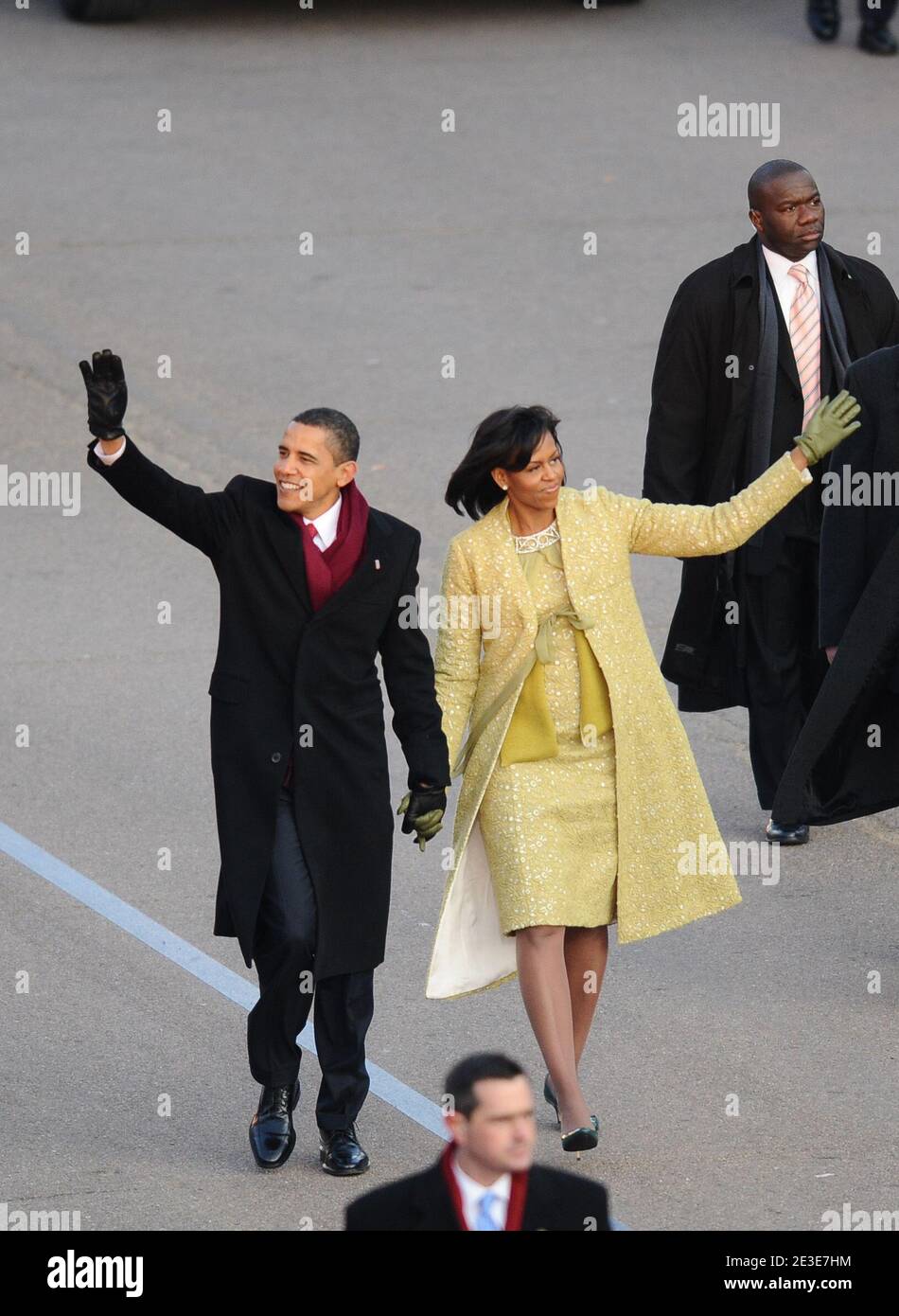 US President Barack Obama and First Lady Michelle Obama walk the ...