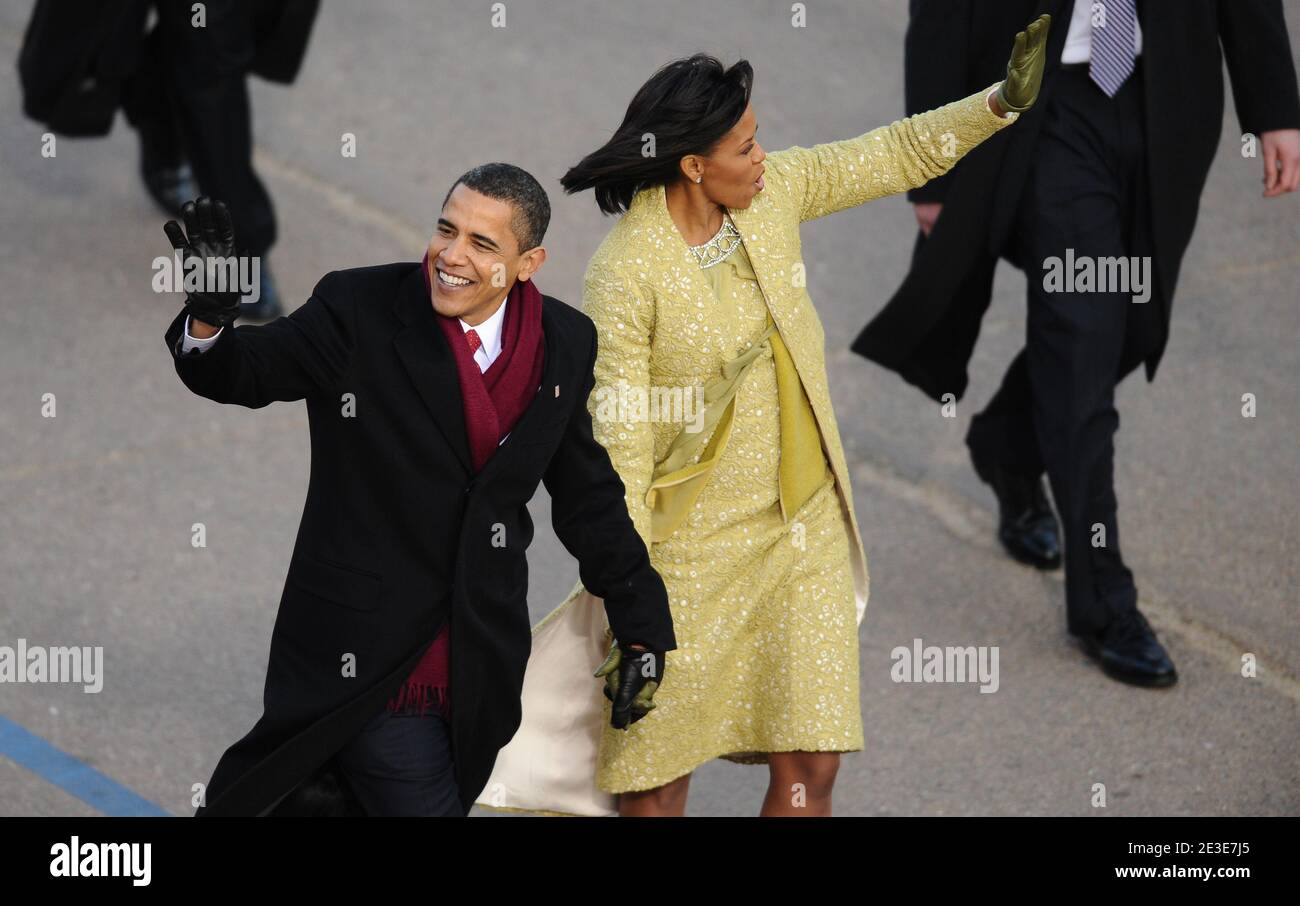 US President Barack Obama and First Lady Michelle Obama walk the ...