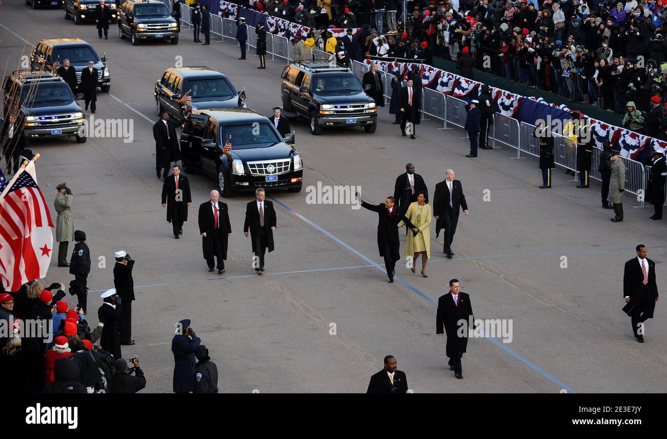 US President Barack Obama and First Lady Michelle Obama walk the ...