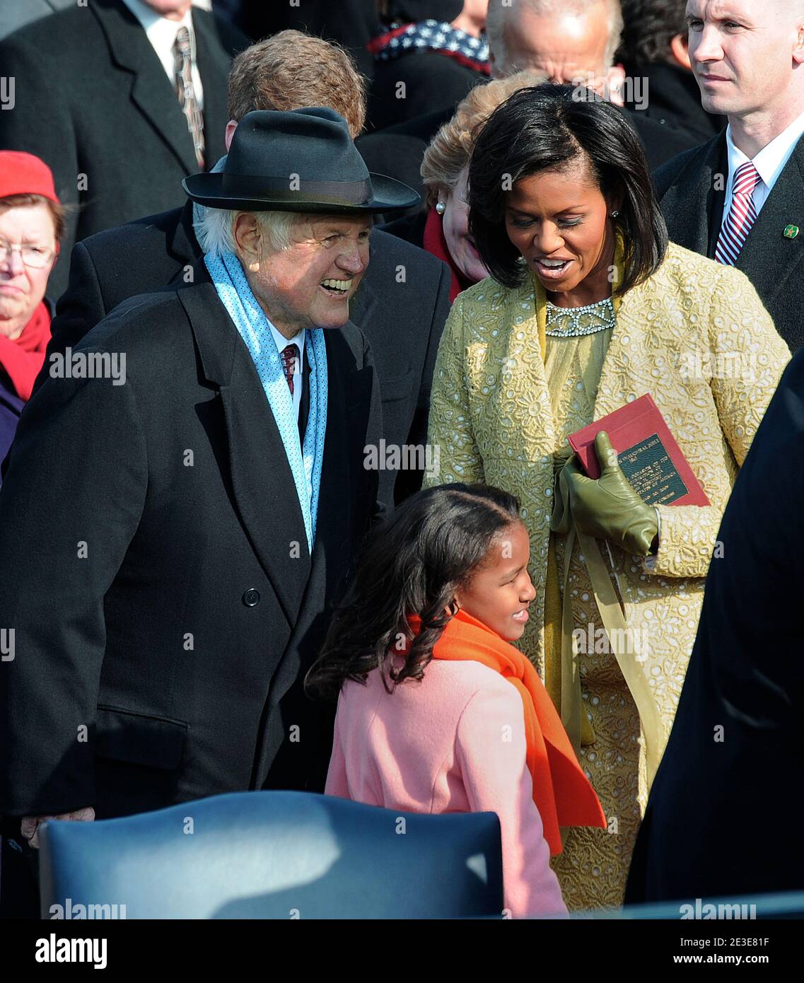 Michelle Obama shares a laugh with Senator Ted Kennedy and Malia Obama ...
