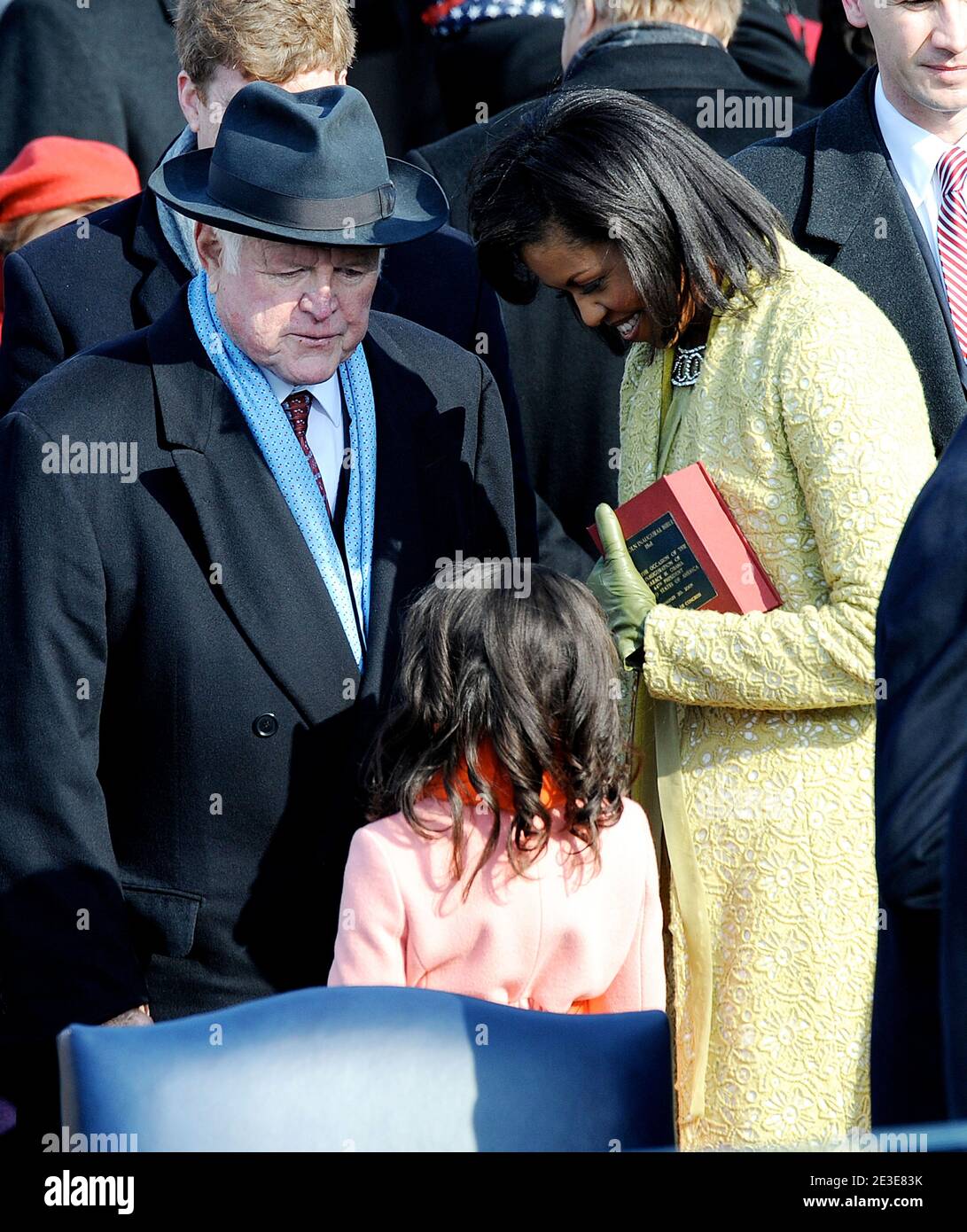 Michelle Obama and Senator Ted Kennedy speak with Malia Obama at ...