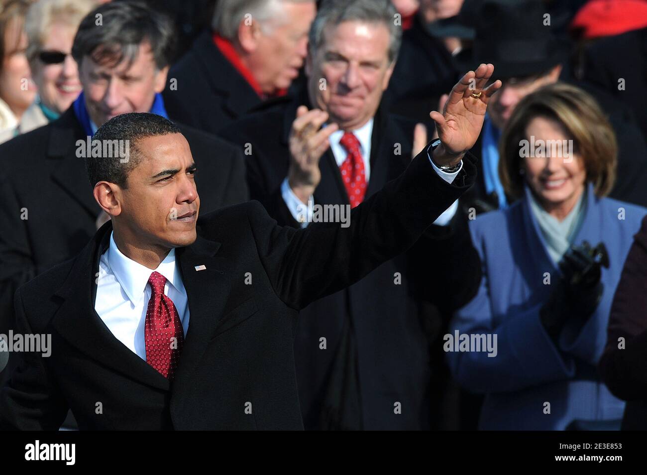 U.S. President Barack Obama waves to the crowd after taking the Oath of ...