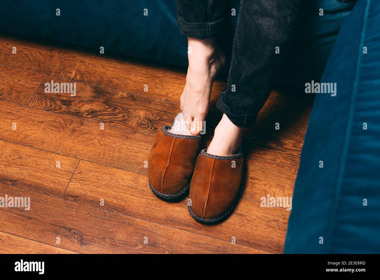 Woman wearing slippers hi-res stock photography and images - Alamy
