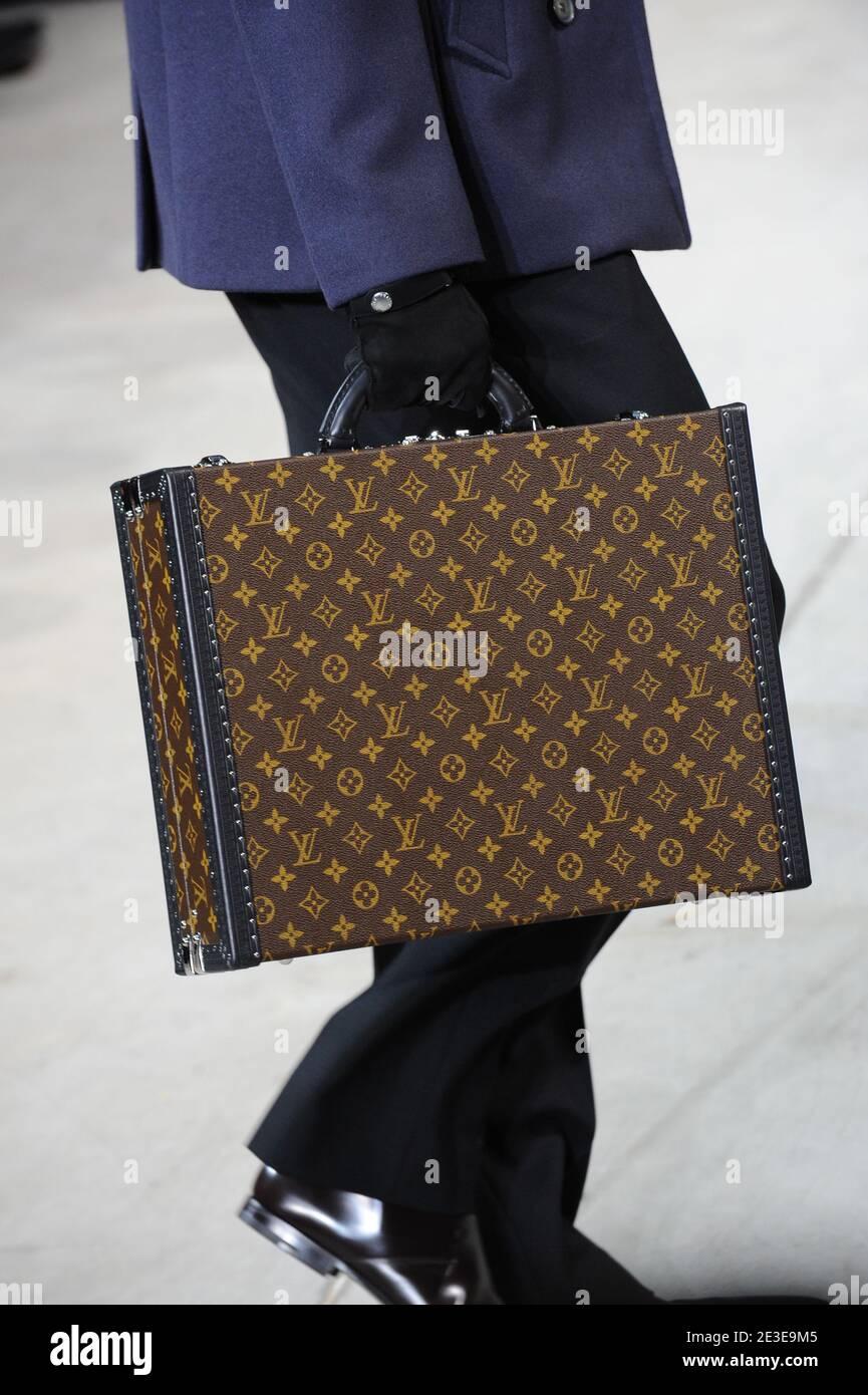 A model displays a creation by designer Paul Helbers for Louis Vuitton ...