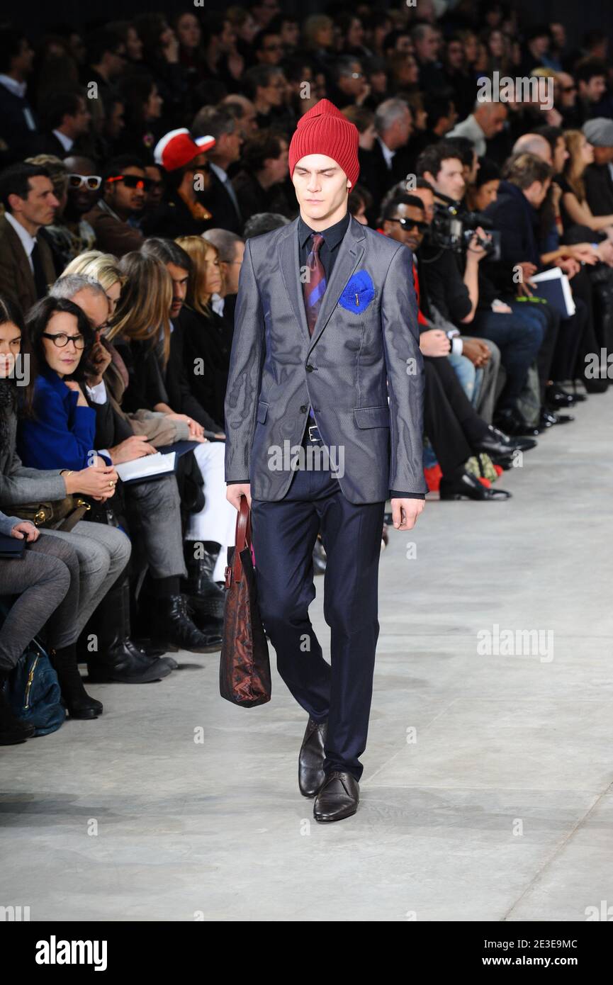 A model displays a creation by designer Paul Helbers for Louis Vuitton ...