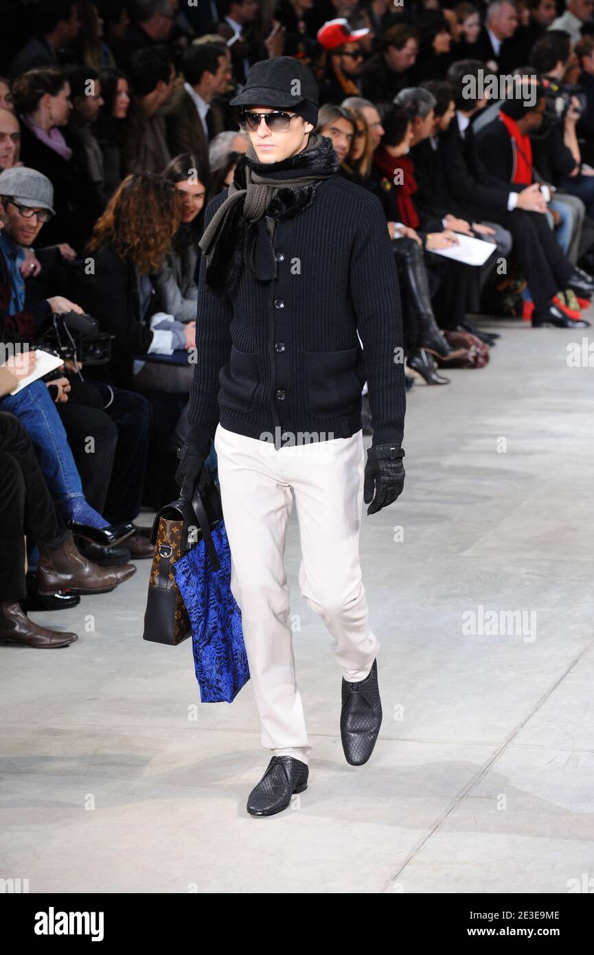 A model displays a creation by designer Paul Helbers for Louis Vuitton ...