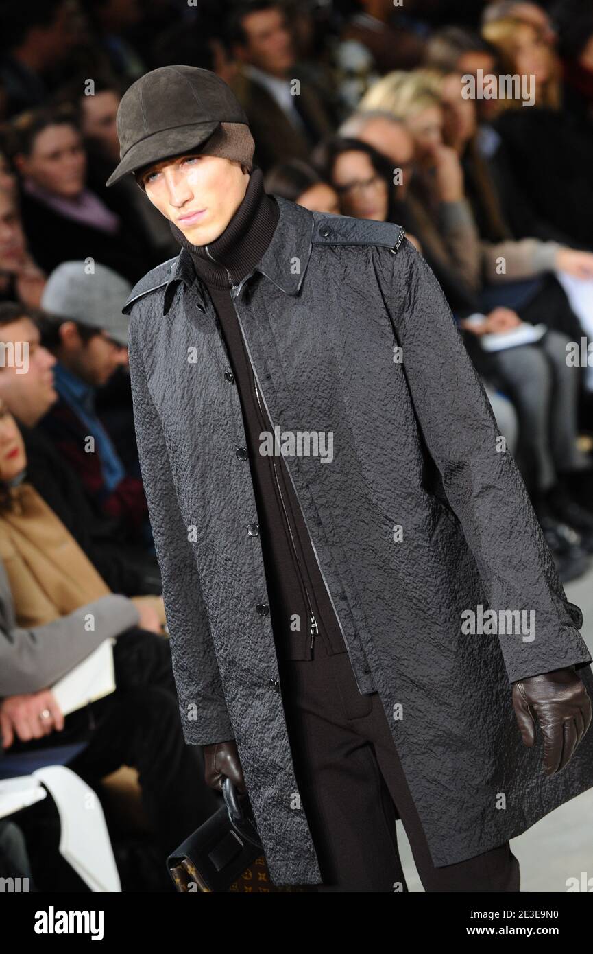 A model displays a creation by designer Paul Helbers for Louis Vuitton ...