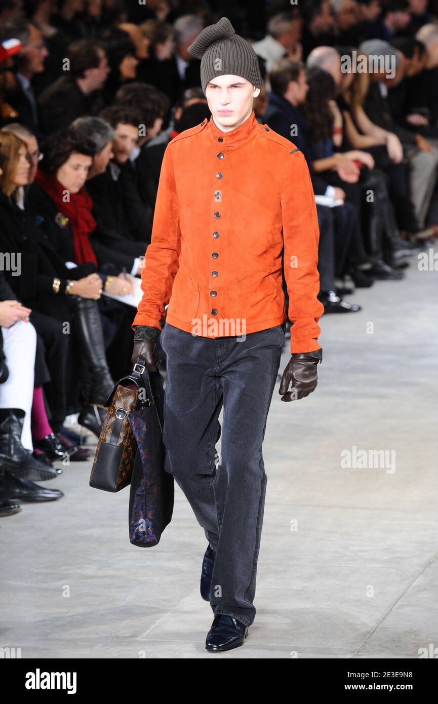 A model displays a creation by designer Paul Helbers for Louis Vuitton ...