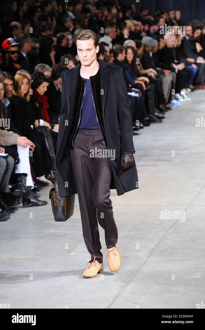 A model displays a creation by designer Paul Helbers for Louis Vuitton ...