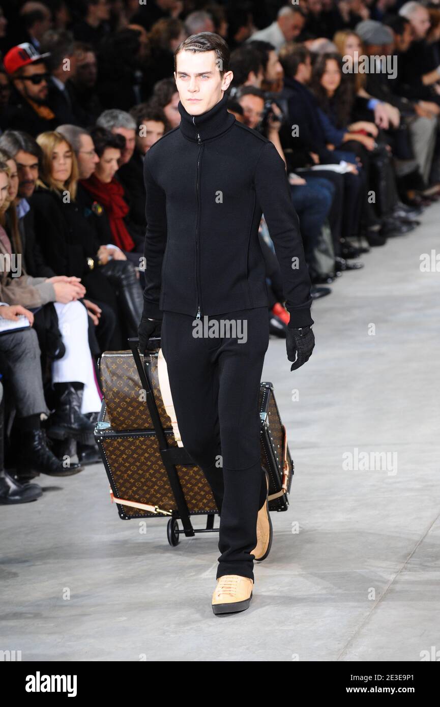 A model displays a creation by designer Paul Helbers for Louis Vuitton ...