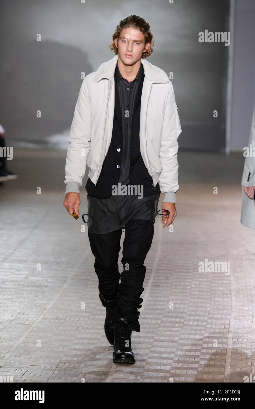 A model displays a creation by Belgian designer Kris Van Assche for his ...