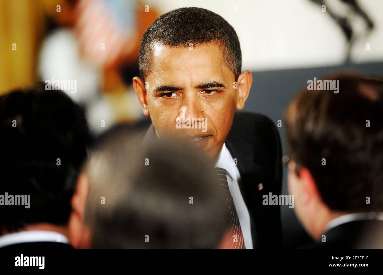 US President Barack Obama signs a series of executive orders on car ...