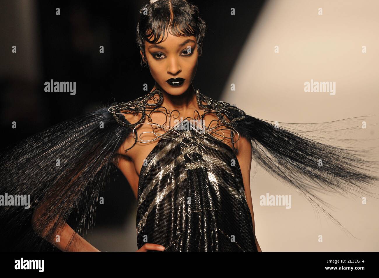 A model displays a creation by French designer Jean-Paul Gaultier for ...