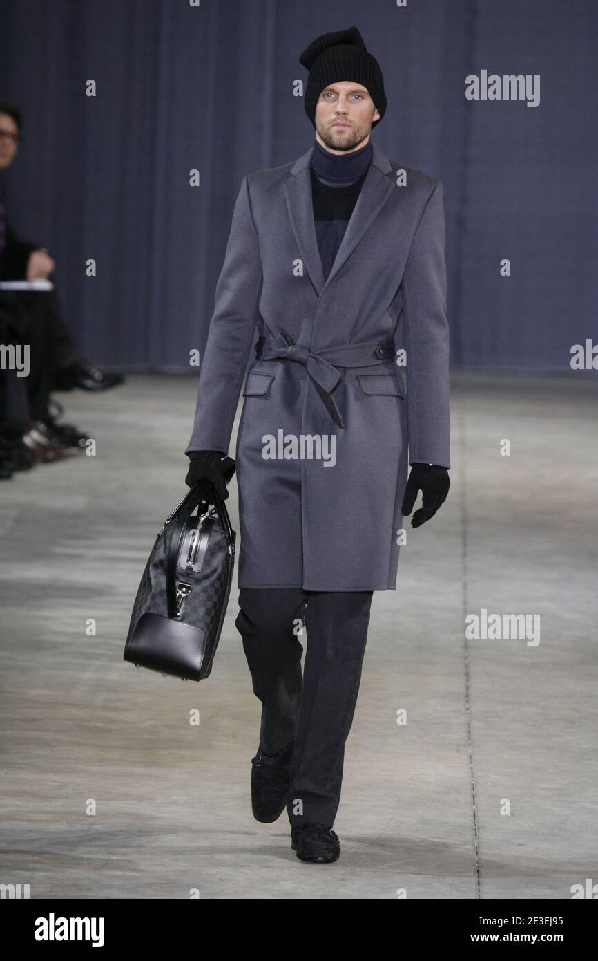 A model displays a creation by designer Paul Helbers for Louis Vuitton ...