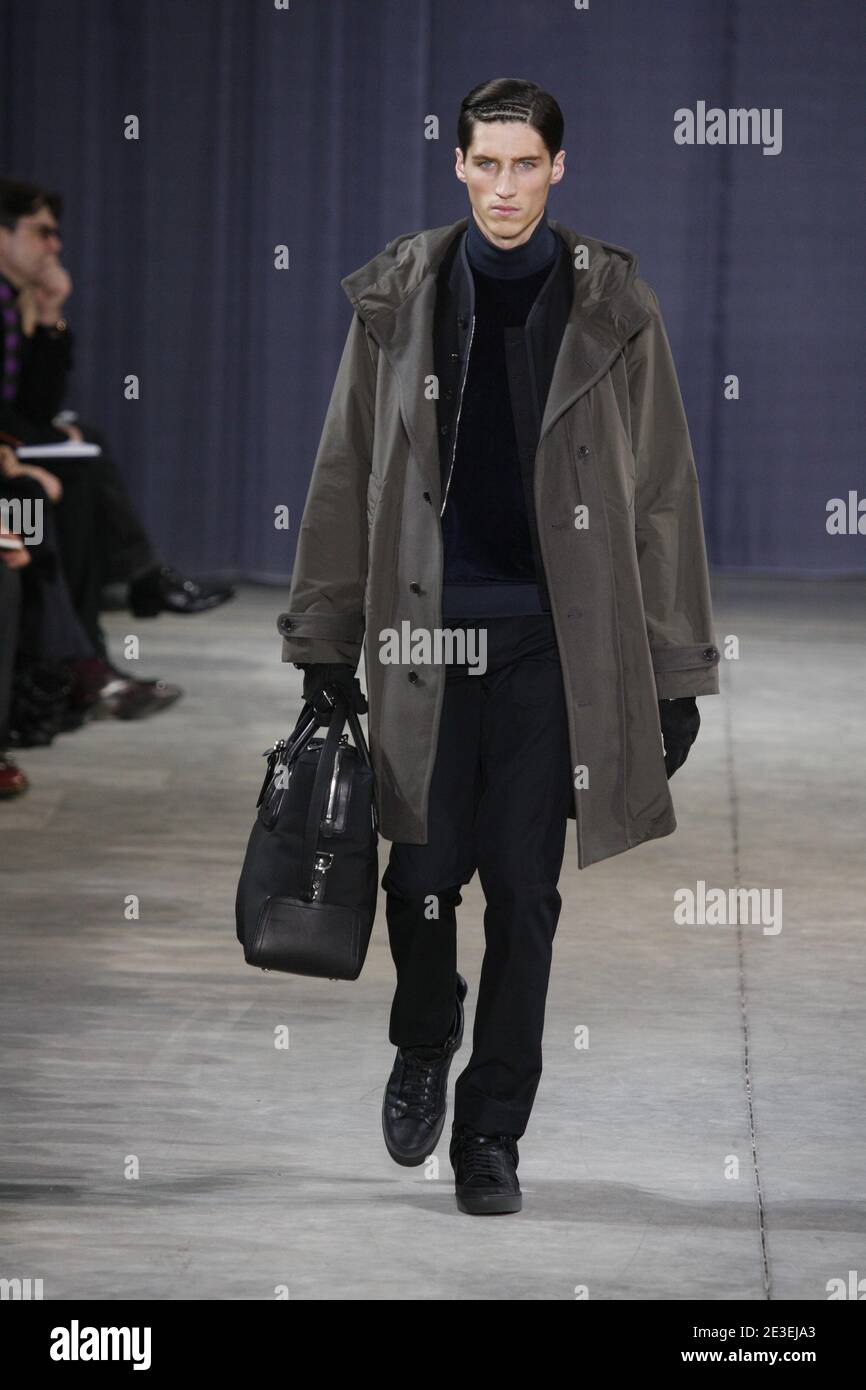 A model displays a creation by designer Paul Helbers for Louis Vuitton ...