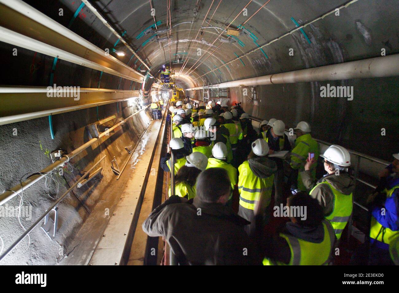 Workers repair damages in the part of the Channel Tunnel known as ...
