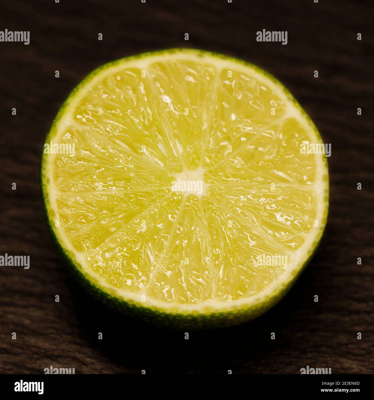 Fresh green lime isolated on white background Stock Photo - Alamy