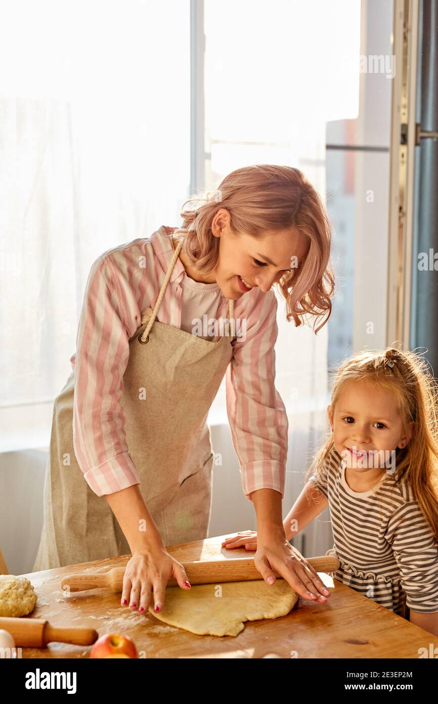 Mother And Daughter Are Going To Bake Charlotte Caucasian Adult Mom