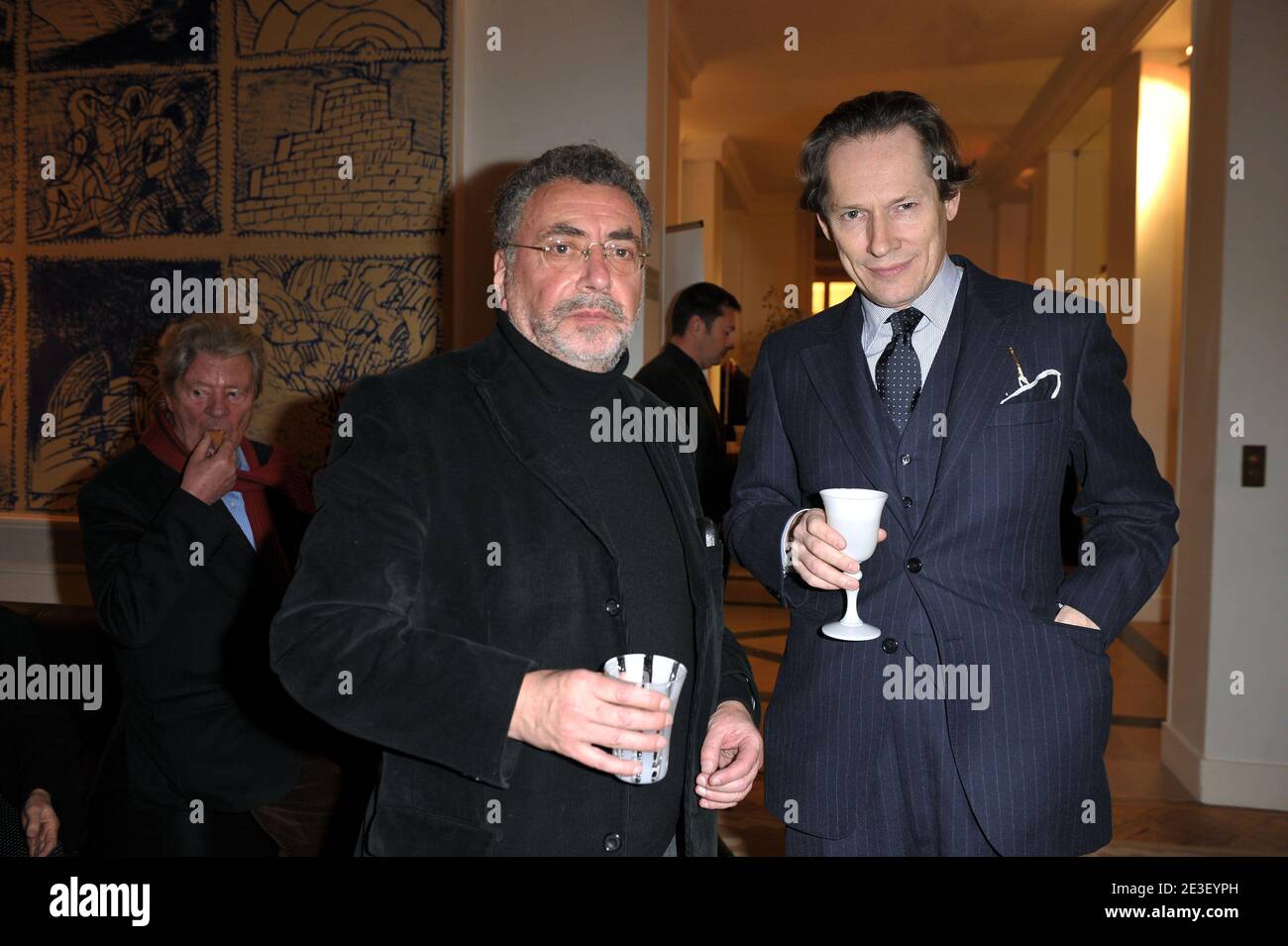 Comics cartoonist Francois Riviere and Floc'h attending a party to ...