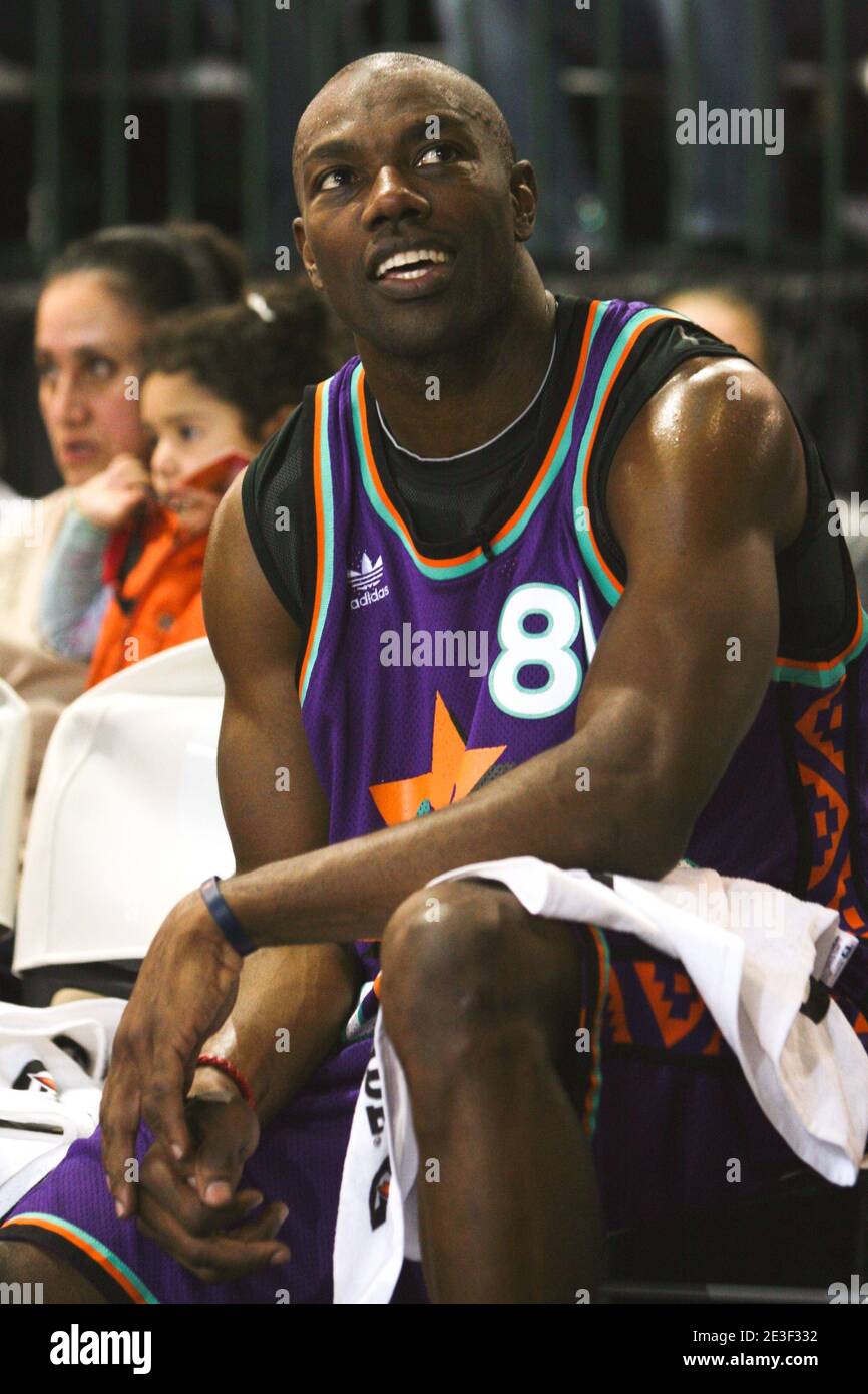 Terrell Owens from the Dallas Cowboys watches from the sidelines at the ...