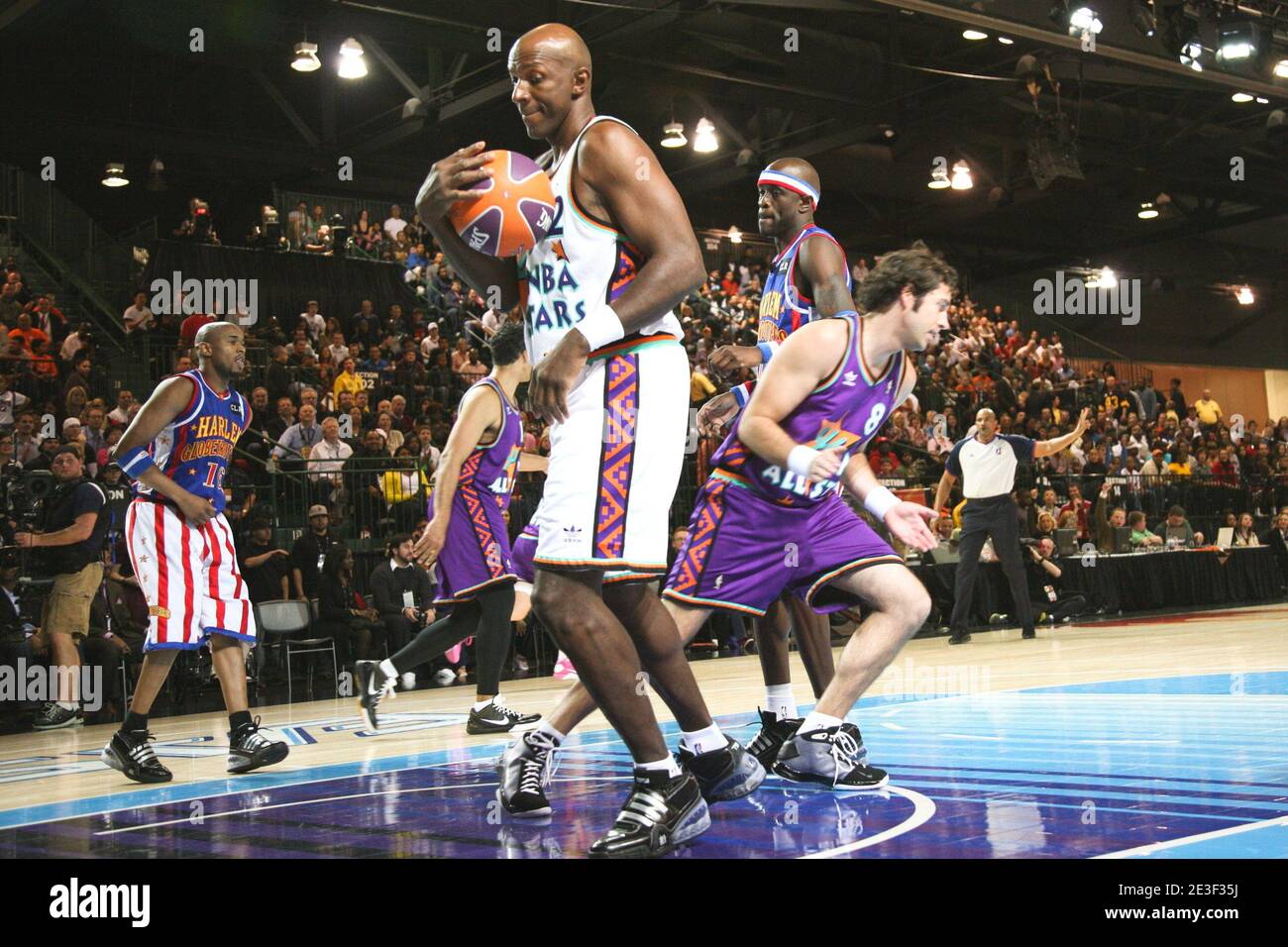Clyde Drexler has the ball at the McDonald's All Star Celebrity Game at ...