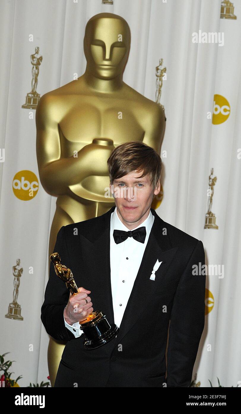 Dustin Lance Black with his award for Original Screenplay in the press ...