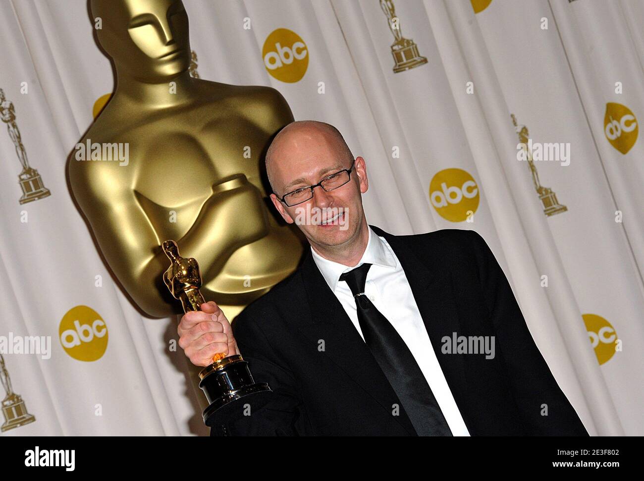 Chris Dickens with his award for Achievement in Film Editing for ...