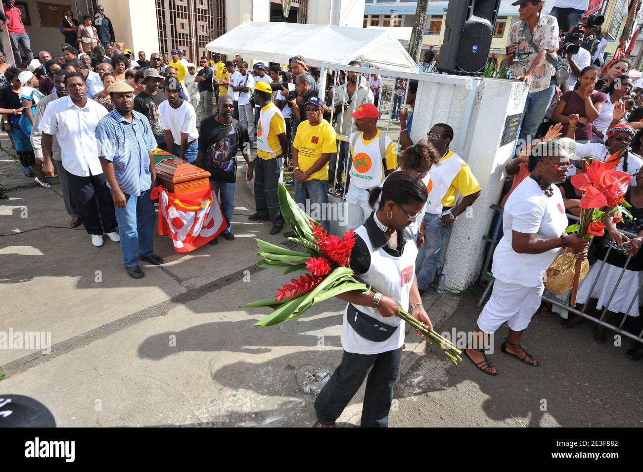 People pay their last respect to unionist Jacques Bino in Pointe-a ...