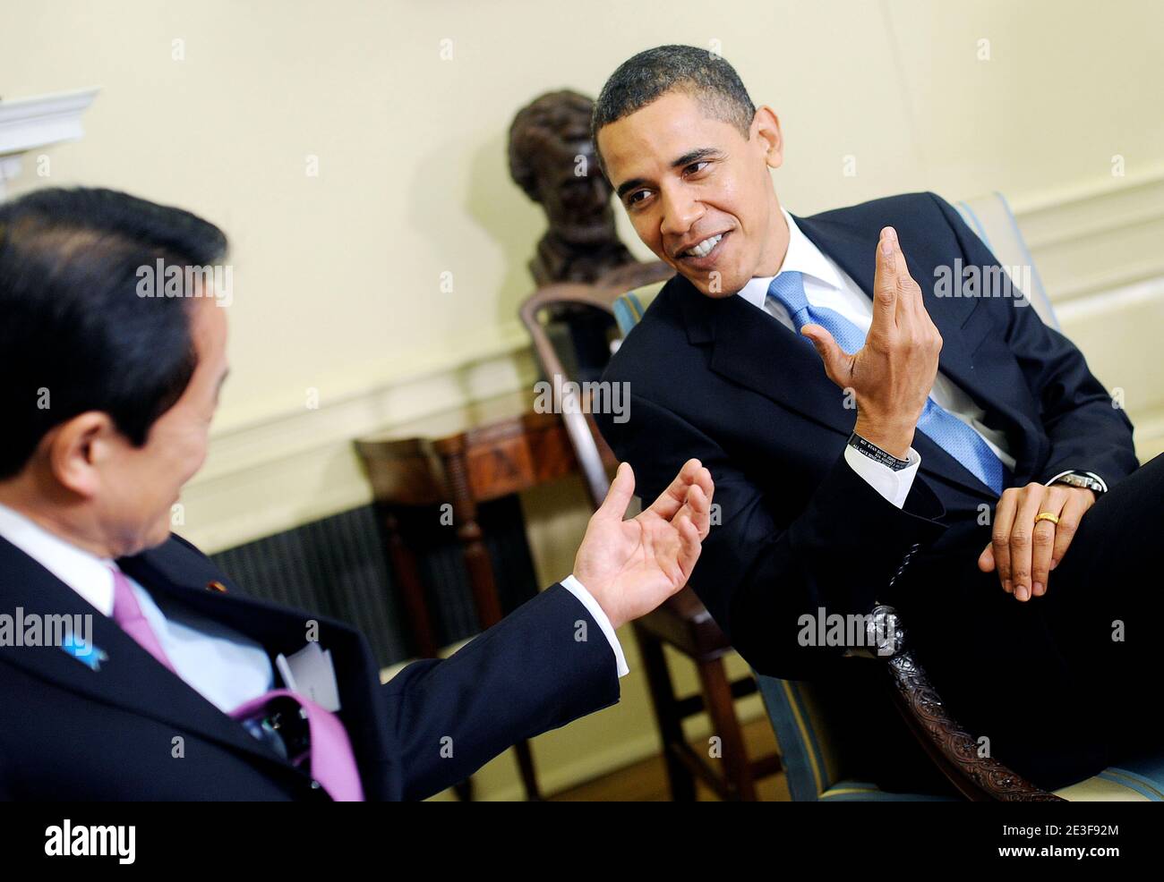 US President Barack Obama (R) meets with Japanese Prime Minister Taro ...