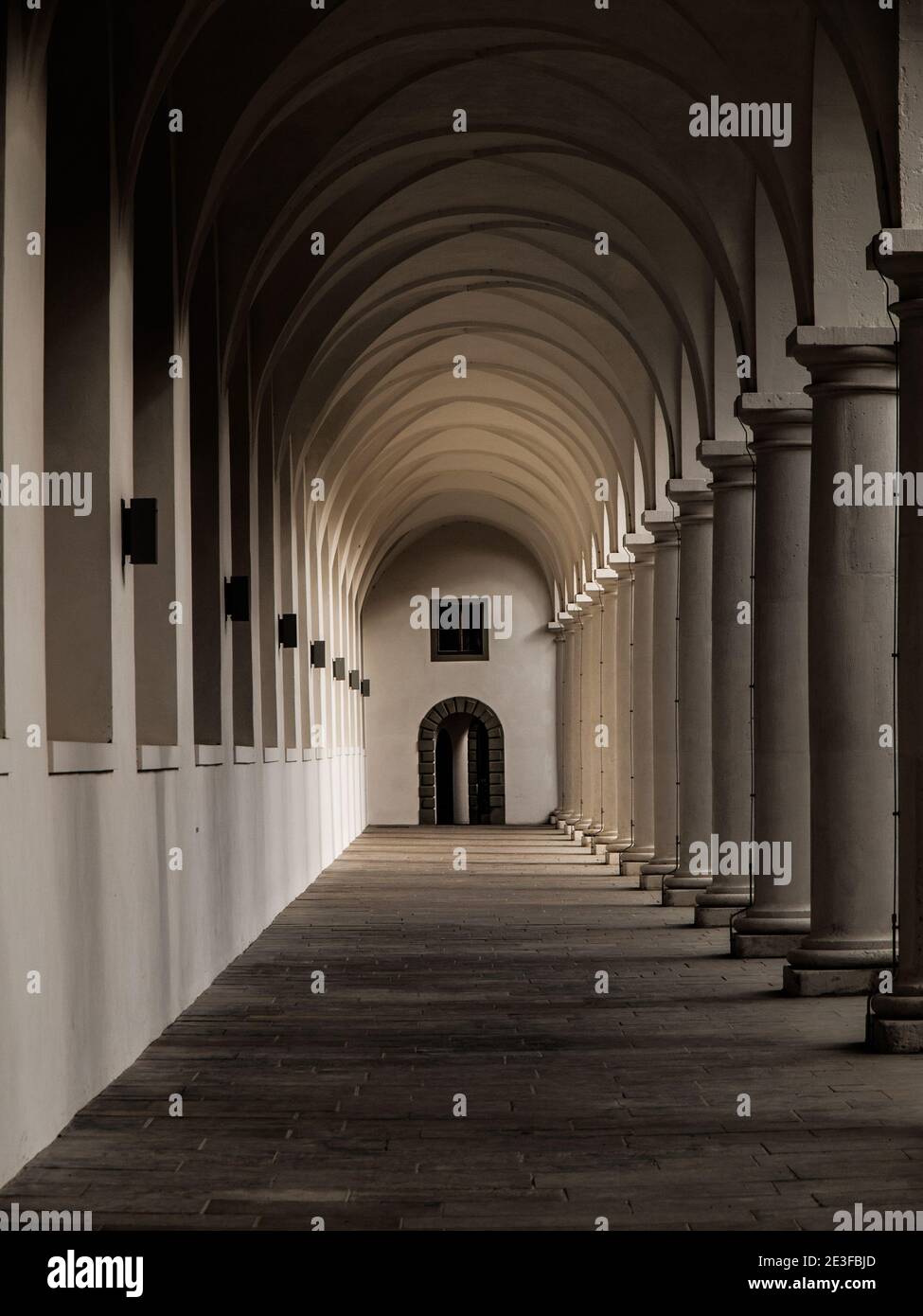 Long corridor with columns in historical building Stock Photo - Alamy