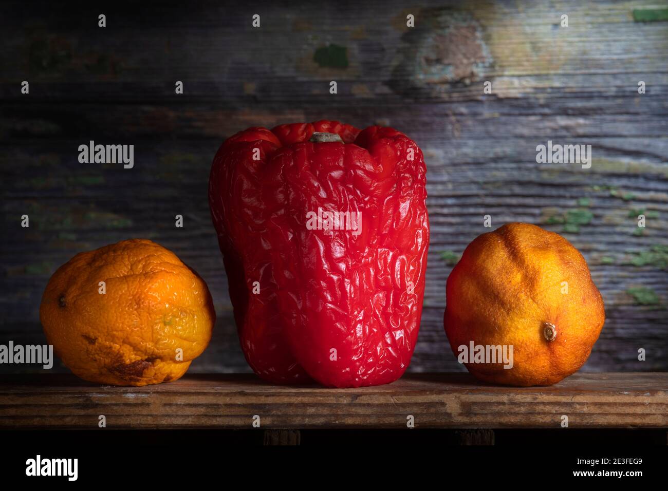 Wrinkled Red Pepper Between Two Dried Lemons. Pleated Drying Red Pepper ...