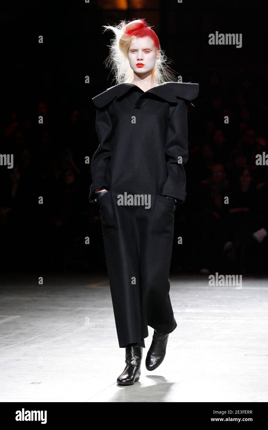 A model presents a creation by Japanese designer Yohji Yamamoto for his ...