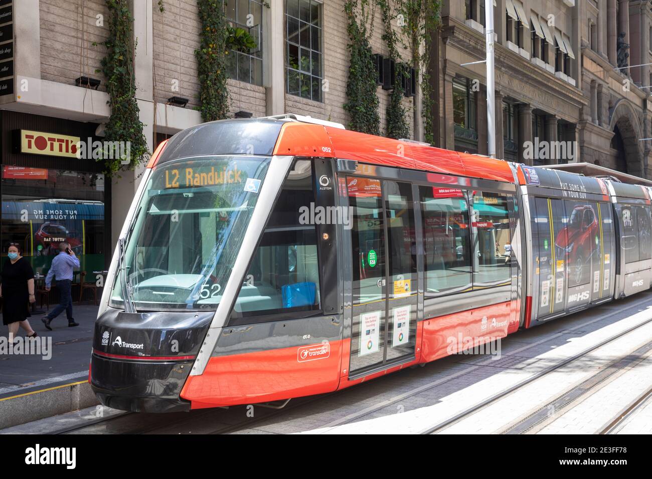 Sydney CBD light rail train running along George Street in Sydney city ...