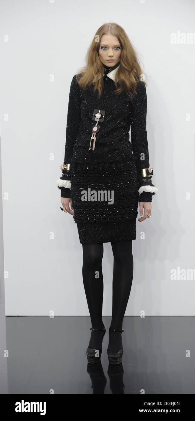 A model displays a creation by designer Karl Lagerfeld for Chanel Fall ...
