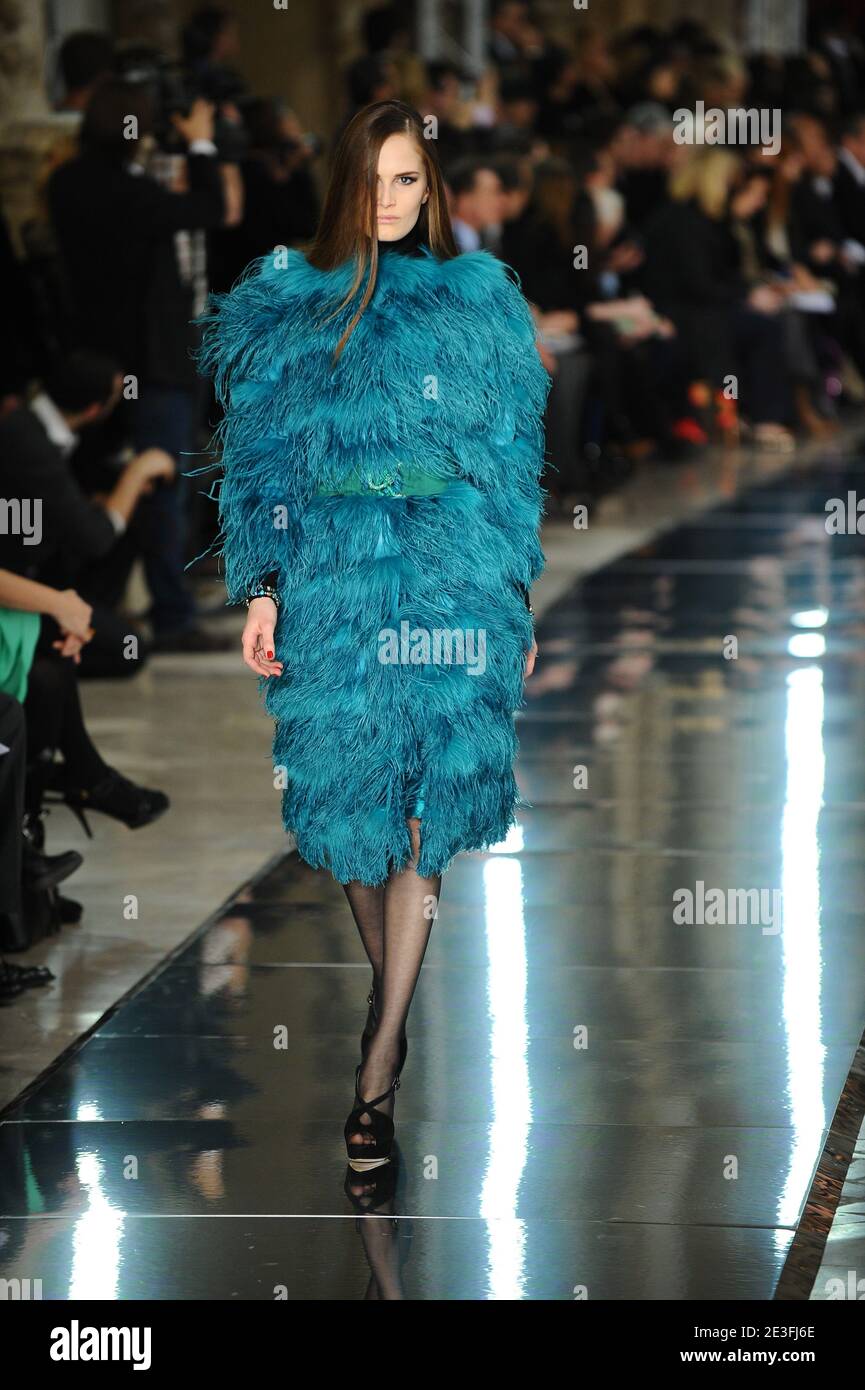 A model displays a creation by Italian designers Maria Grazia Chiuri ...