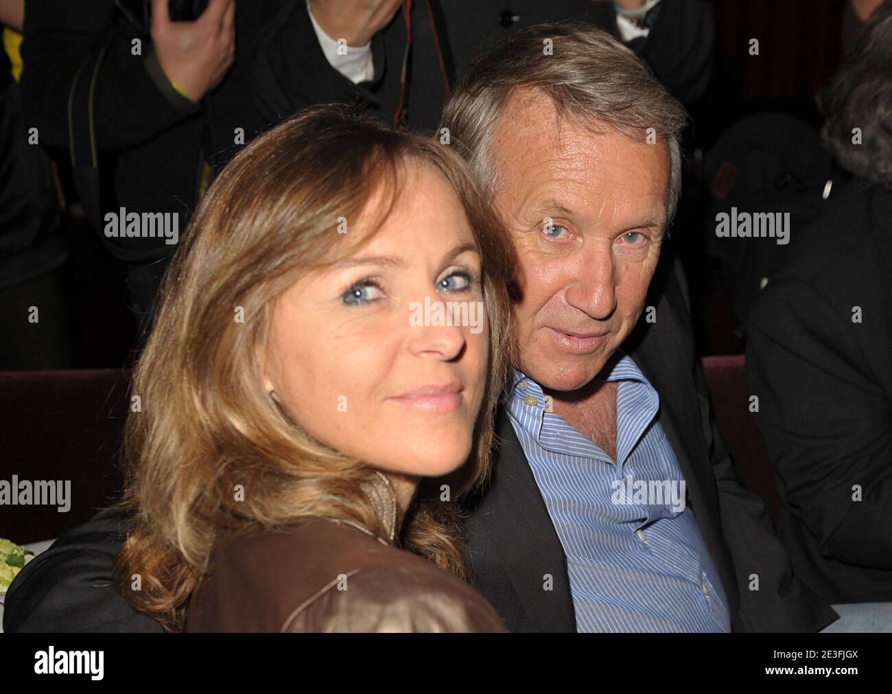 Yves Regnier and his wife attend a party at the Pink Paradise to ...