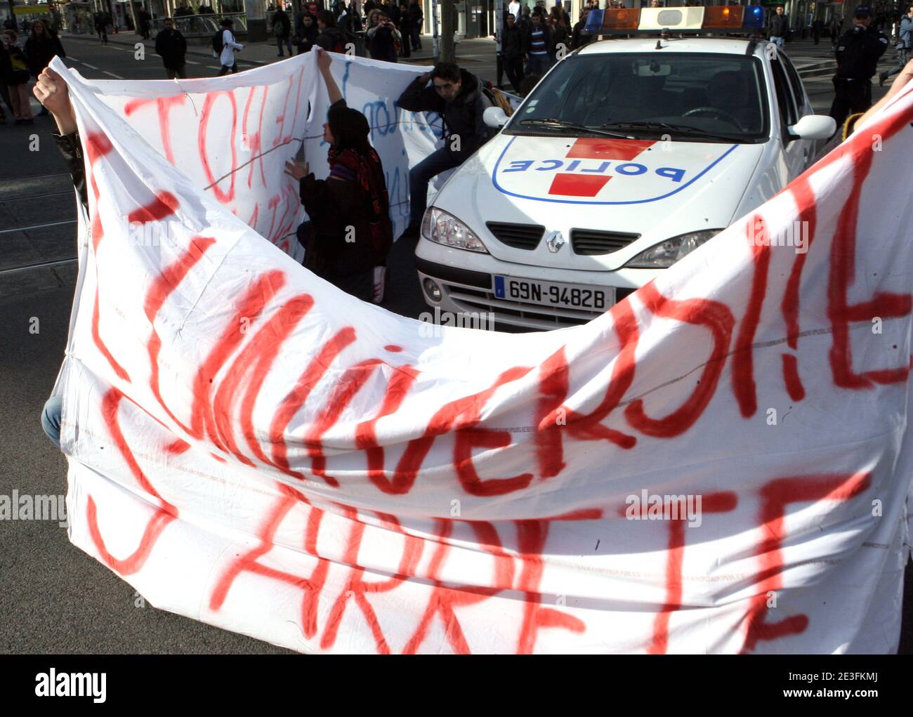 People take part in a demonstration in Lyon, eastern France, on March ...