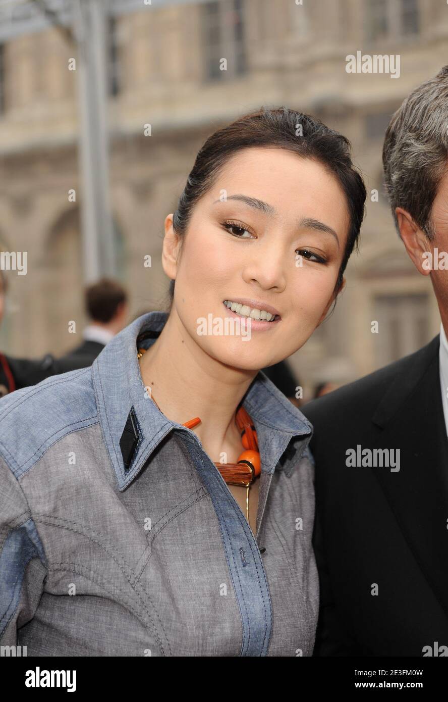 Gong Li attending the Louis Vuitton Fall-Winter 2009-2010 ready-to-wear ...