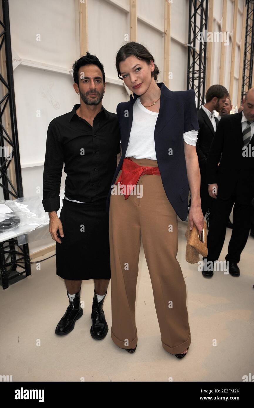 Milla Jovovich and Marc Jacobs attending the Louis Vuitton Fall-Winter ...