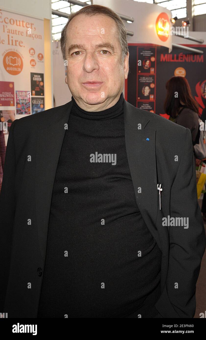 Paul-Loup Sulitzer poses during the Paris Book Fair 'Le Salon Du Livre ...