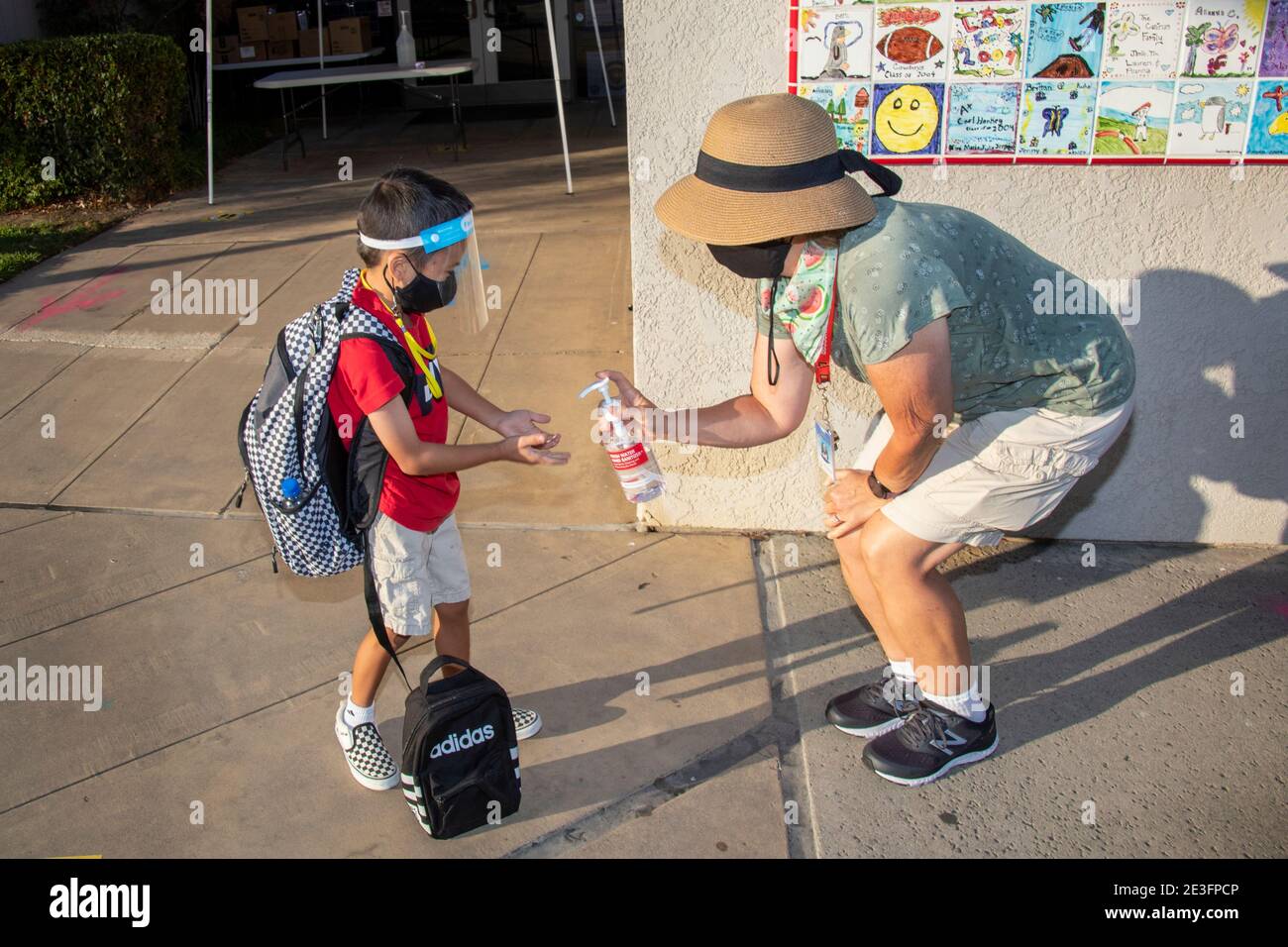 Arriving for the first day of school during the corornavirus pandemic ...