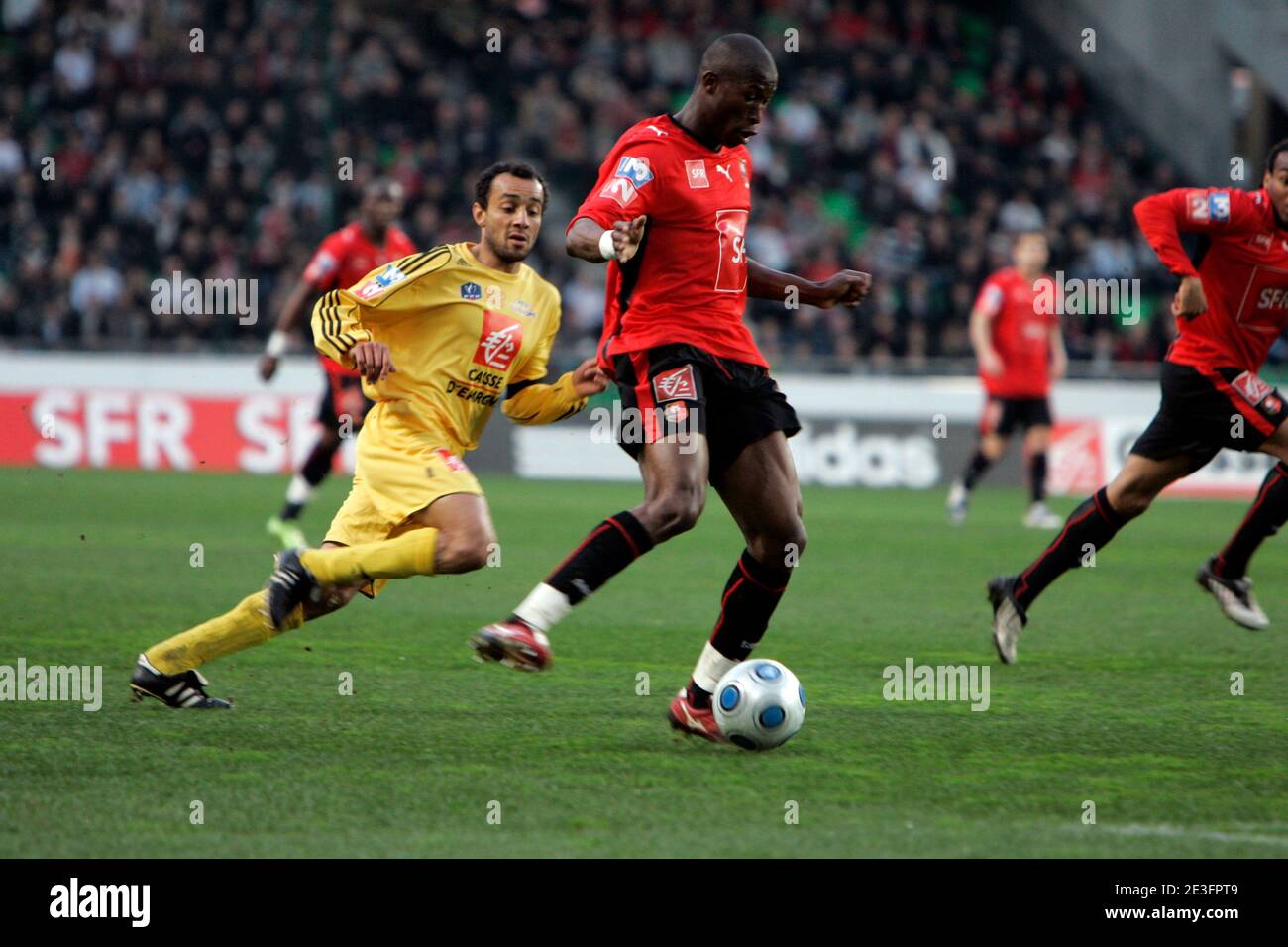 Rennes' Rod Fanni and Rodez's Gregory Ursule during the French Cup ...