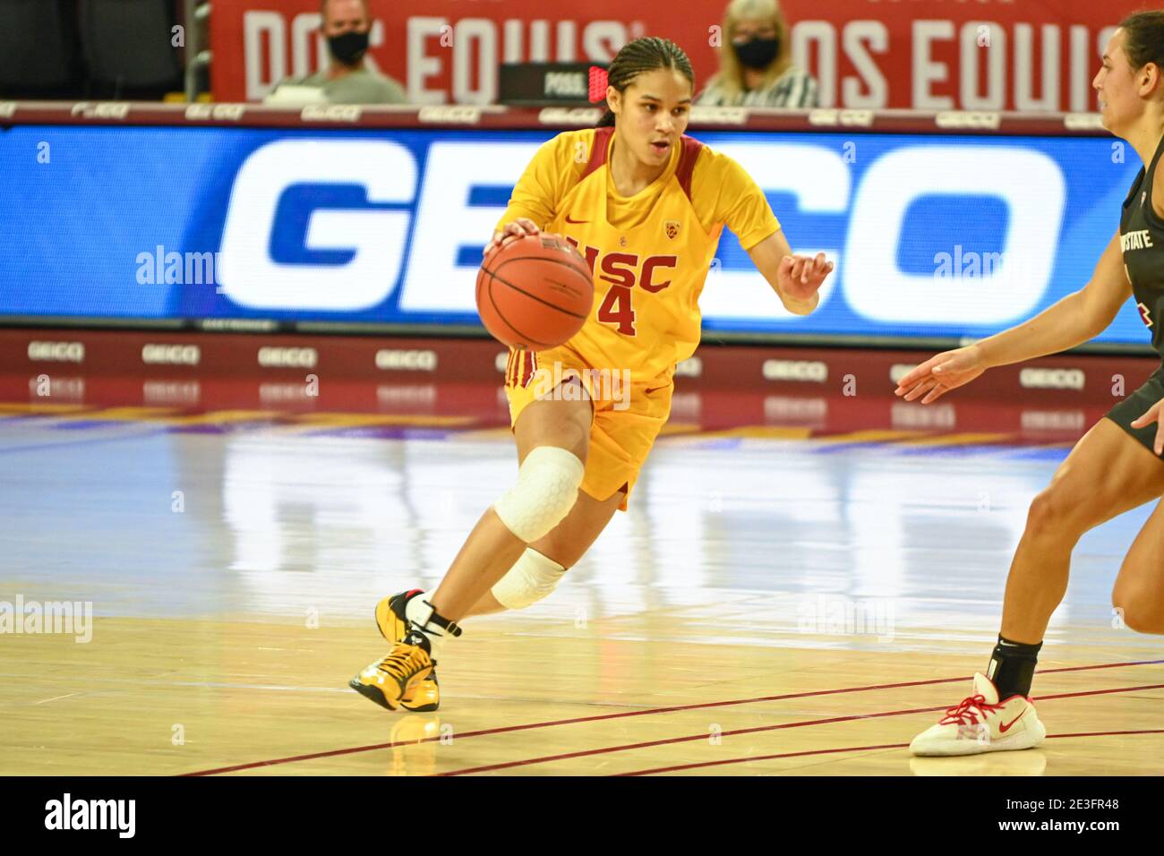 Southern California Trojans guard Endyia Rogers (4) dribbles the ball ...