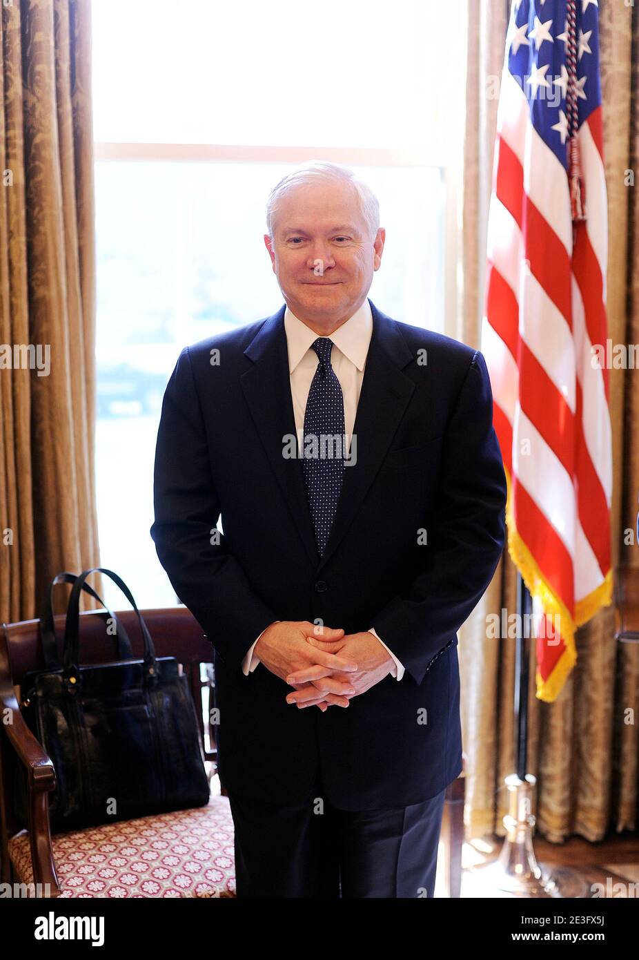 Defense Secretary Robert Gates attends a meeting between U.S. President ...