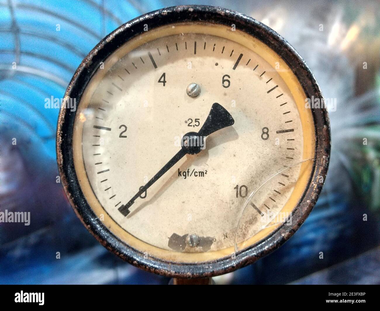 Old vintage rusty psi bar pressure measurement gauge installed on ...