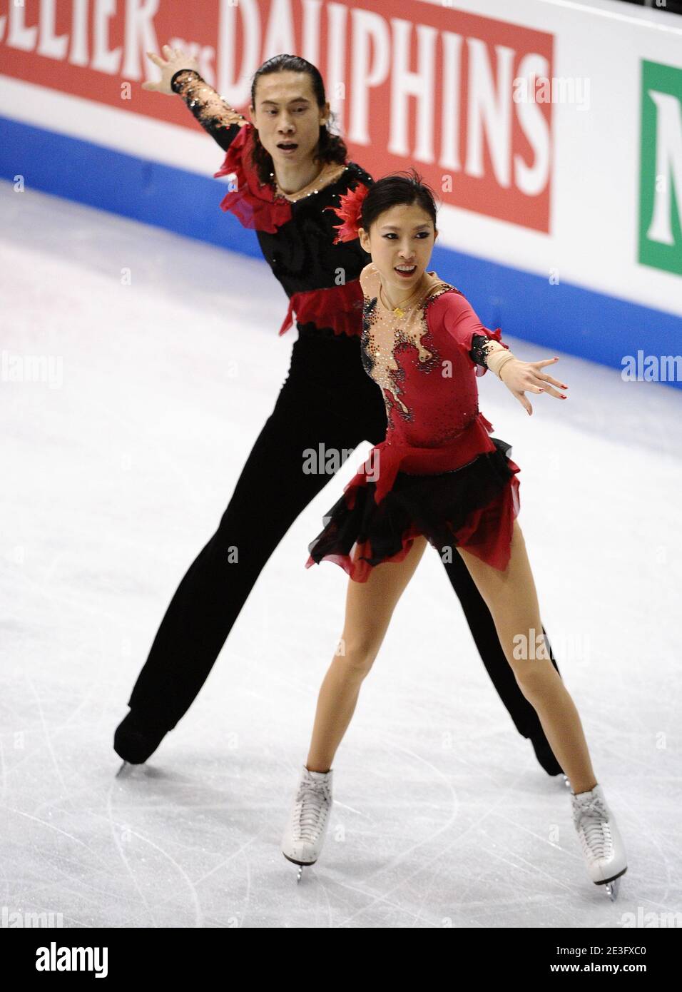 Qing Pang and Jian Tong of China performing the pairs free skating ...