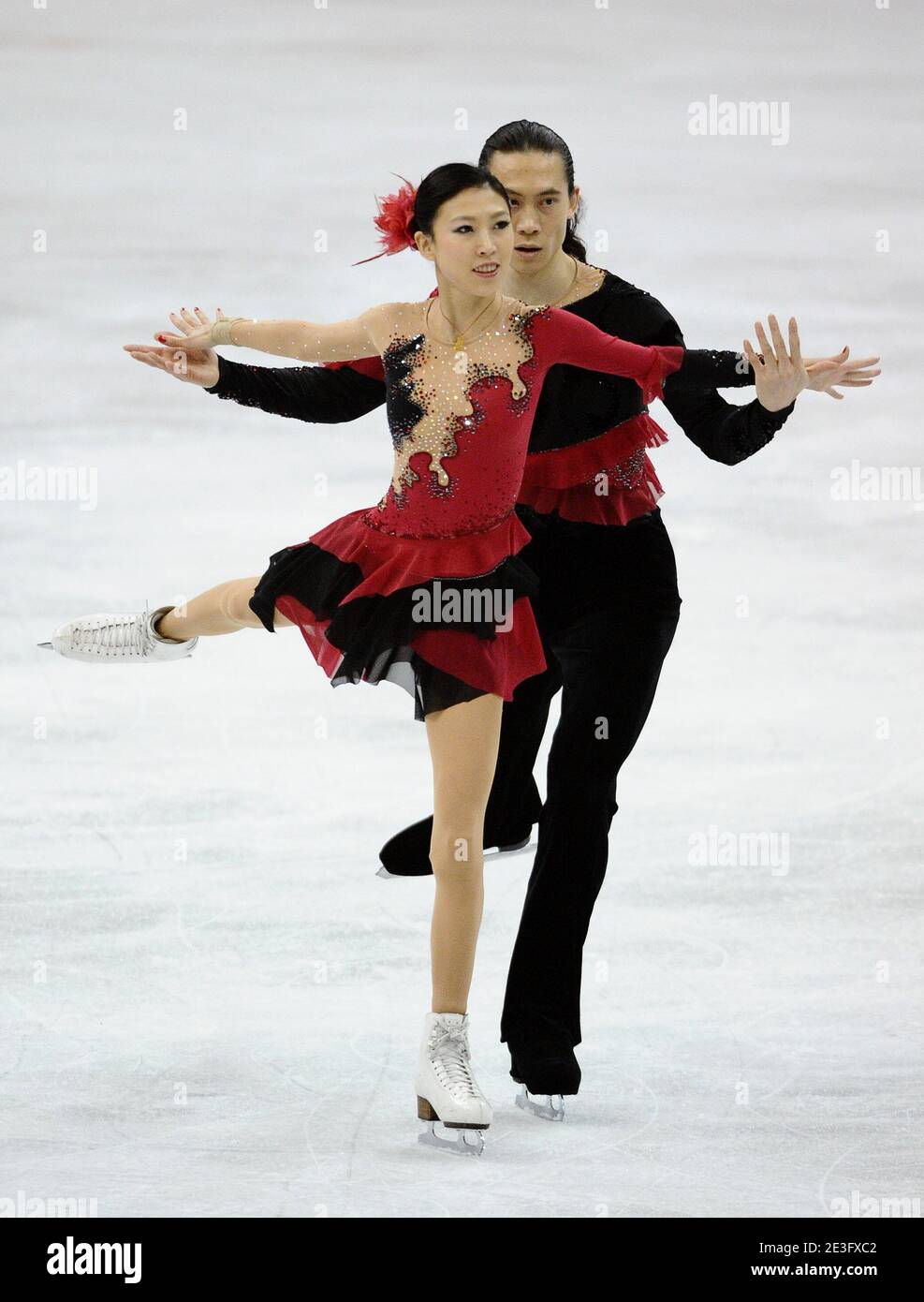 Qing Pang and Jian Tong of China performing the pairs free skating ...