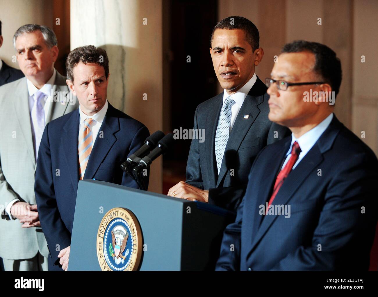 U.S. President Barack Obama, with Treasury Secretary Timothy Geithner ...