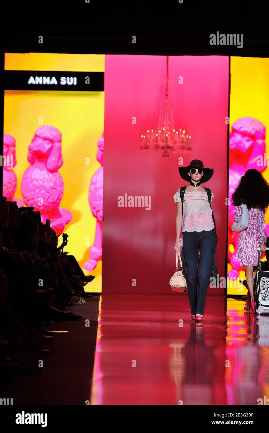 A model displays a creation by Anna Sui at the Barbie Runway Show ...