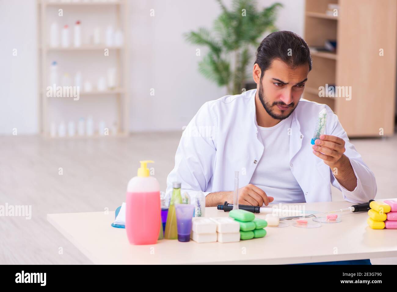 Young chemist testing soap in the lab Stock Photo - Alamy